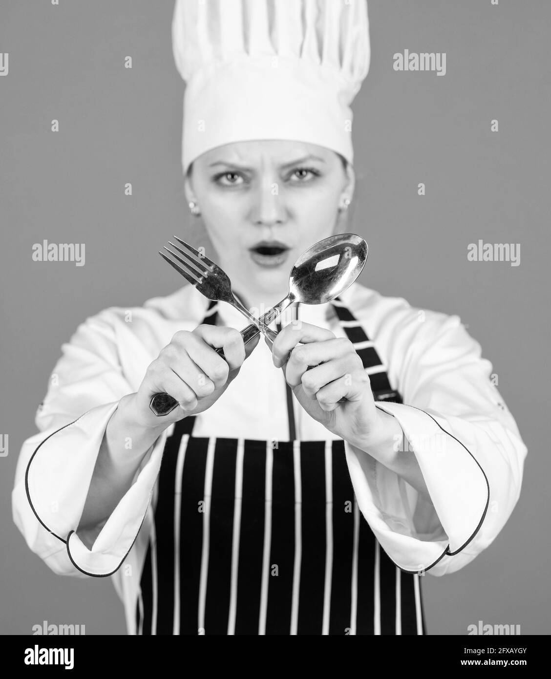 cook in restaurant. Professional Chef Working in Famous Restaurant ...