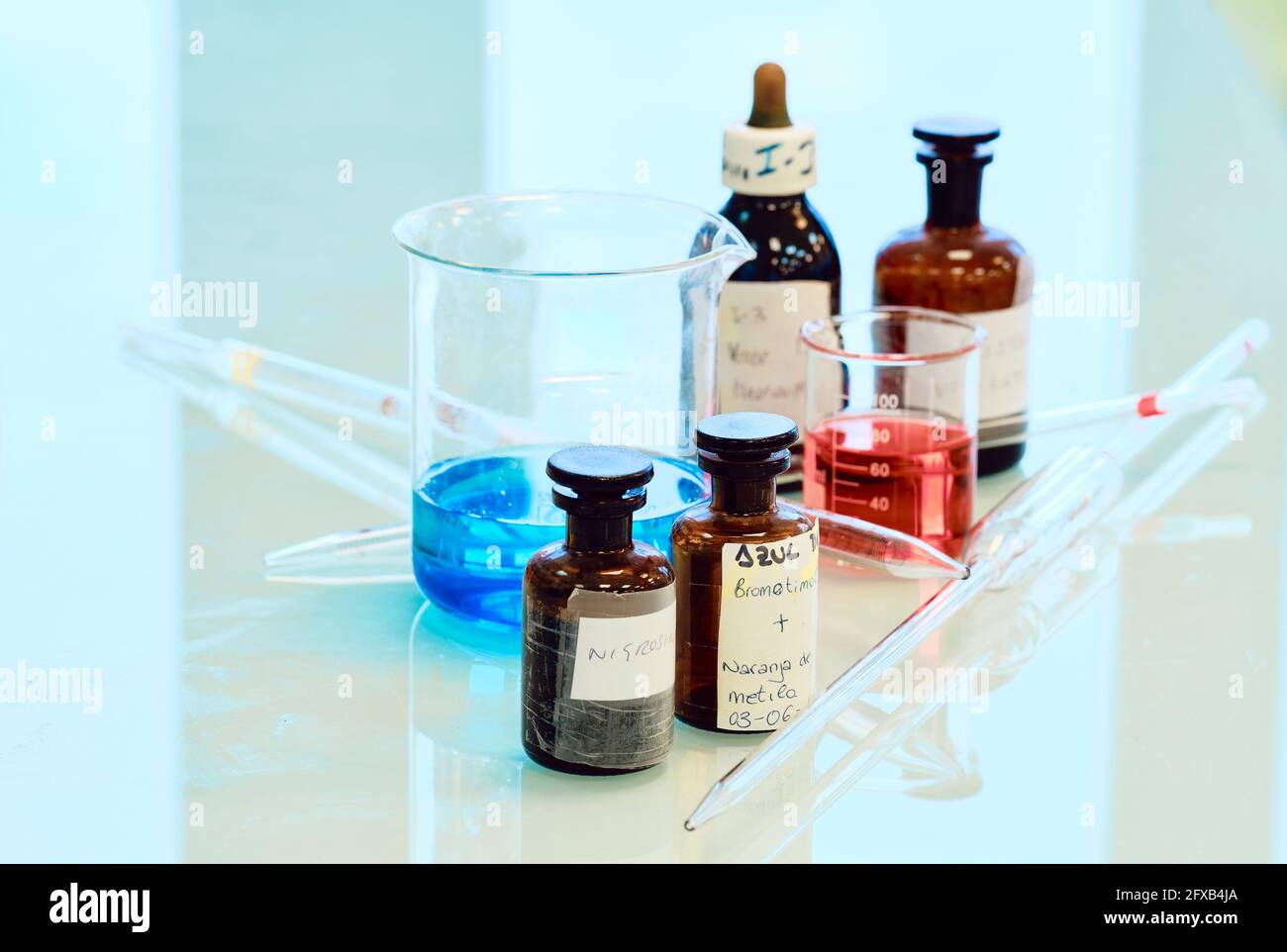 Flasks with dyes in a scientific laboratory. Basque Country, Spain ...