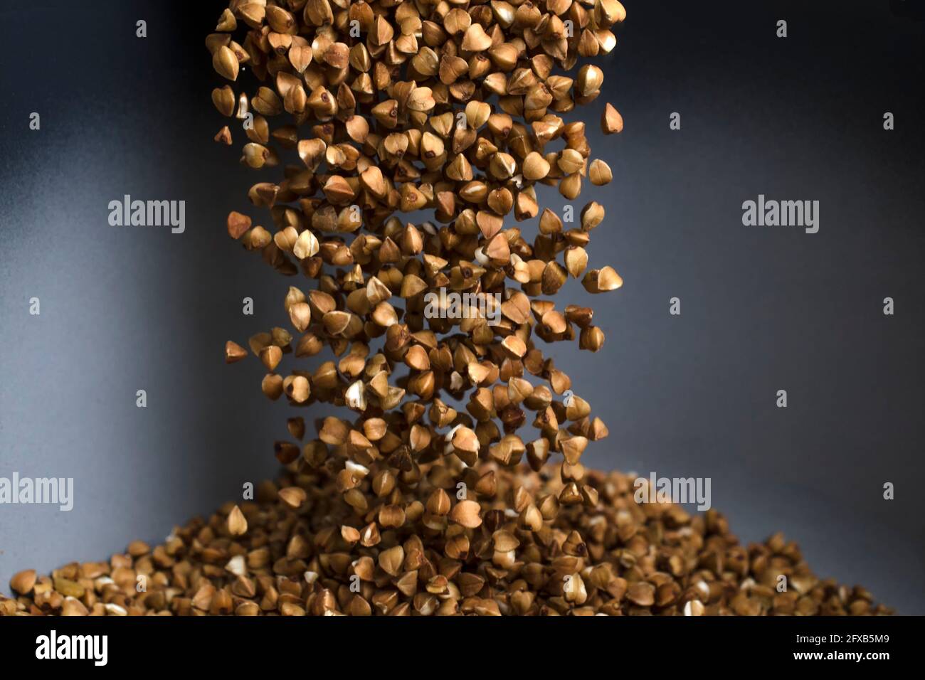 Buckwheat porridge poured out Stock Photo - Alamy