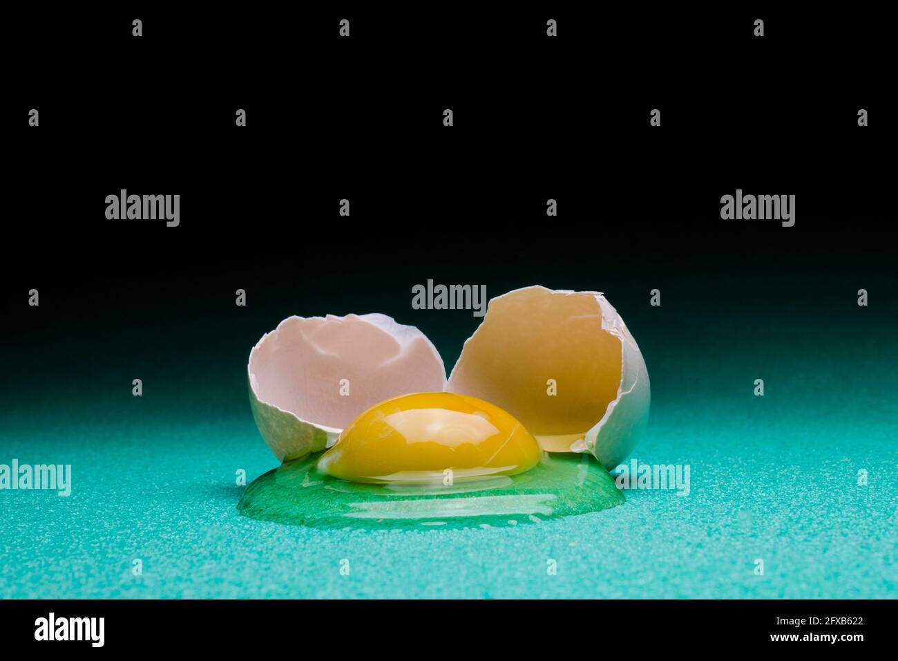 raw egg white and yolk close-up isolated Stock Photo - Alamy
