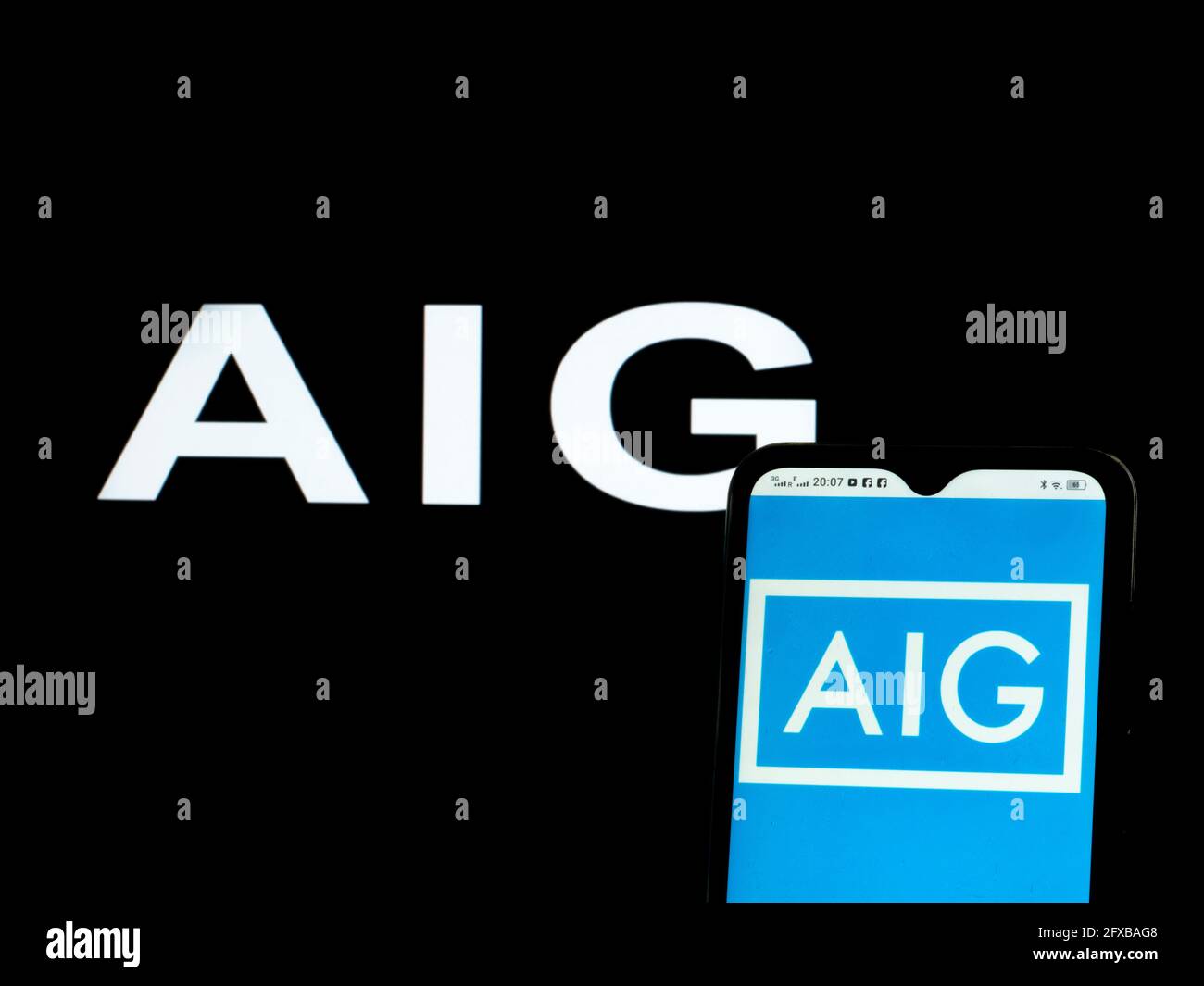 In this photo illustration American International Group logo seen ...