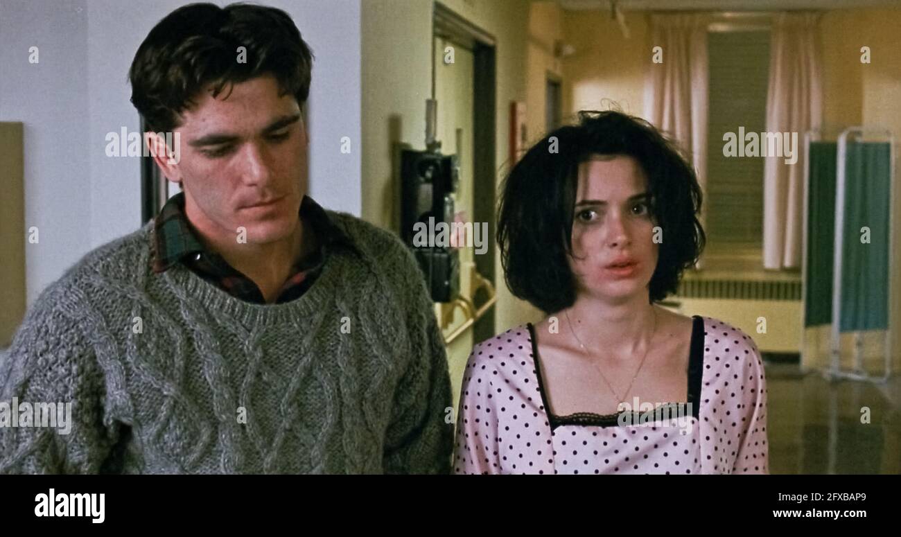 USA. Winona Ryder and Michael Schoeffling in a scene from the (C)Orion ...