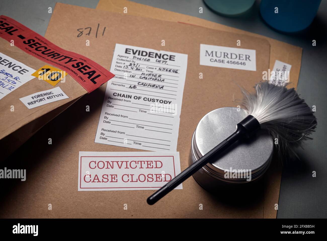Files and evidence bag in a crime lab, conceptual image Stock Photo - Alamy