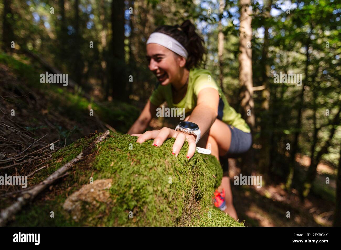 Runner climbing rock athlete hi-res stock photography and images - Alamy