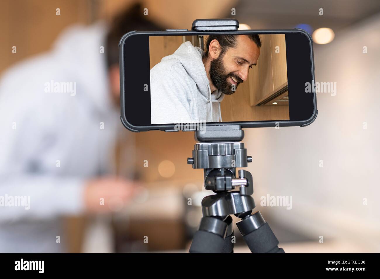 Man filming on his phone hi-res stock photography and images - Alamy