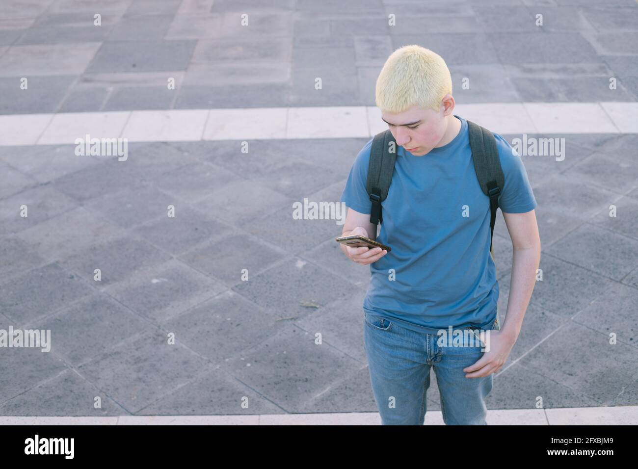 Hand phone backpack hi-res stock photography and images - Alamy