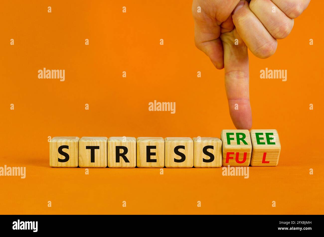 Reduce stress symbol. Businessman turns cubes, changes words 'stress ...