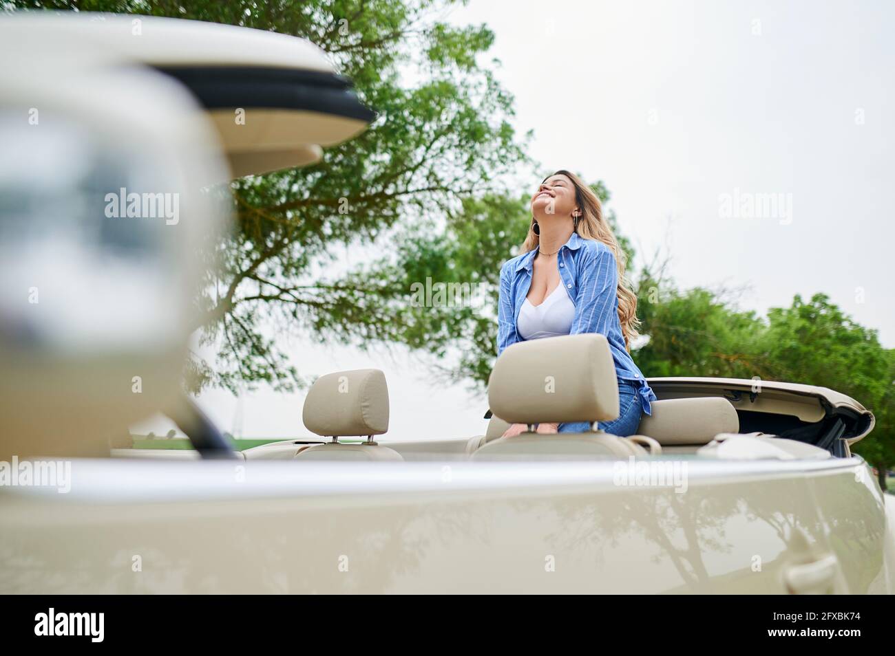 Woman in convertible hi-res stock photography and images - Alamy