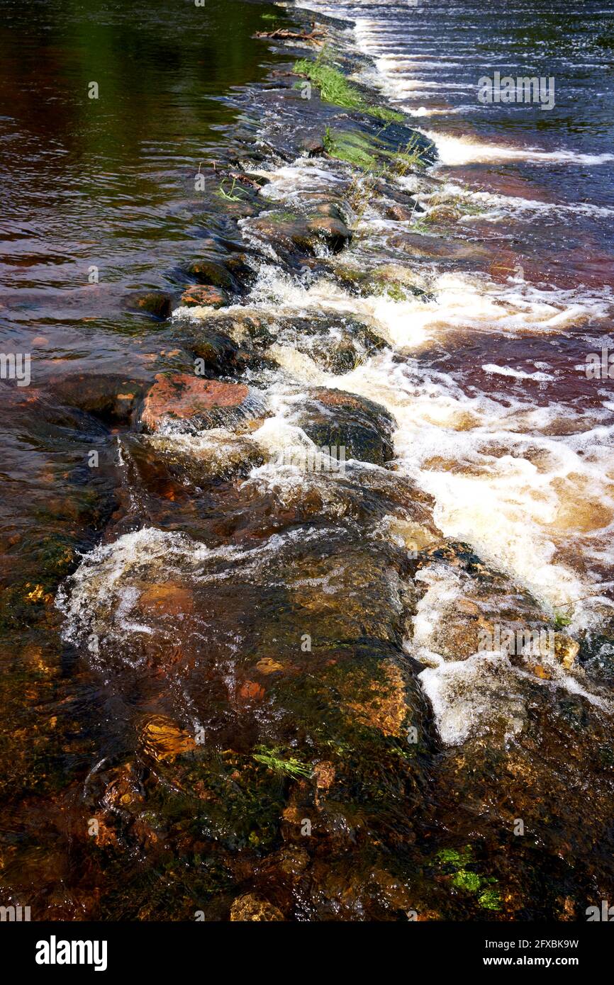 Waters gushing over natural dam on Ogre river in Ogre city Latvia Stock ...