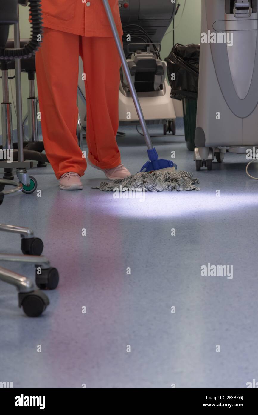 Close-up of a mop cleaning the operating room used by a cleaning ...