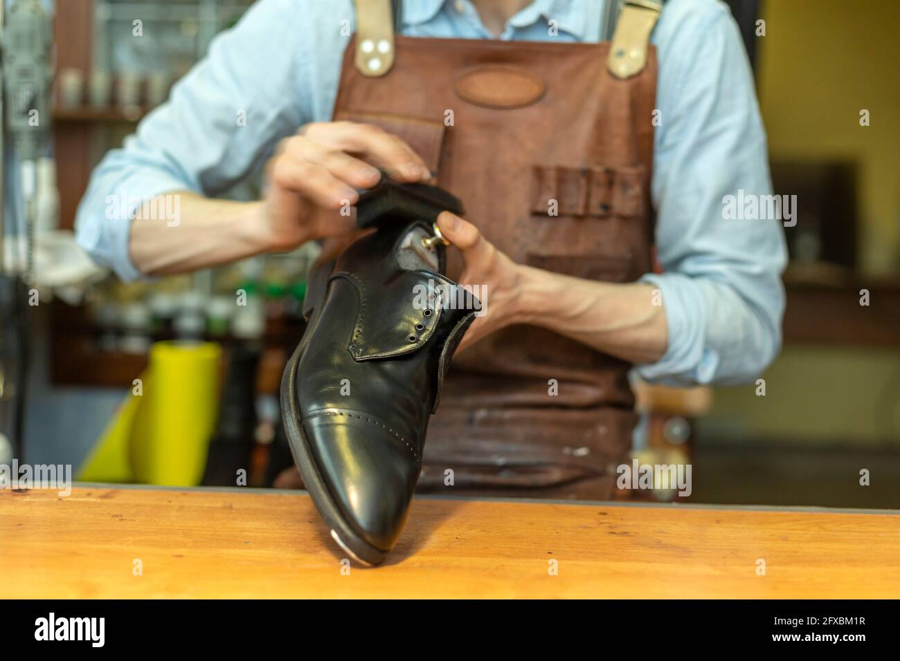 Shoemaker hi-res stock photography and images - Alamy