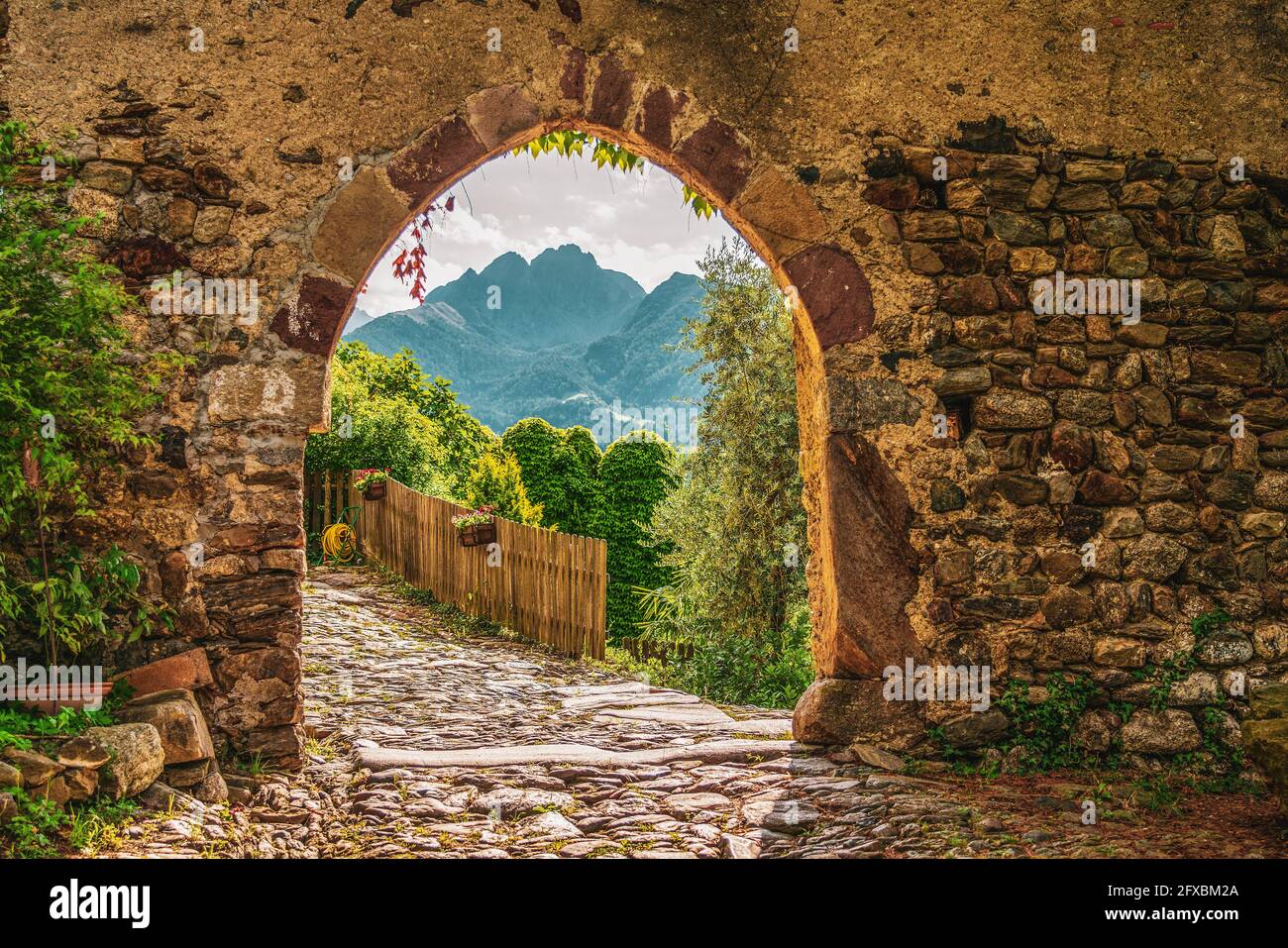 Old castle gate with a view of South Tyrolean mountains in Italy Stock ...