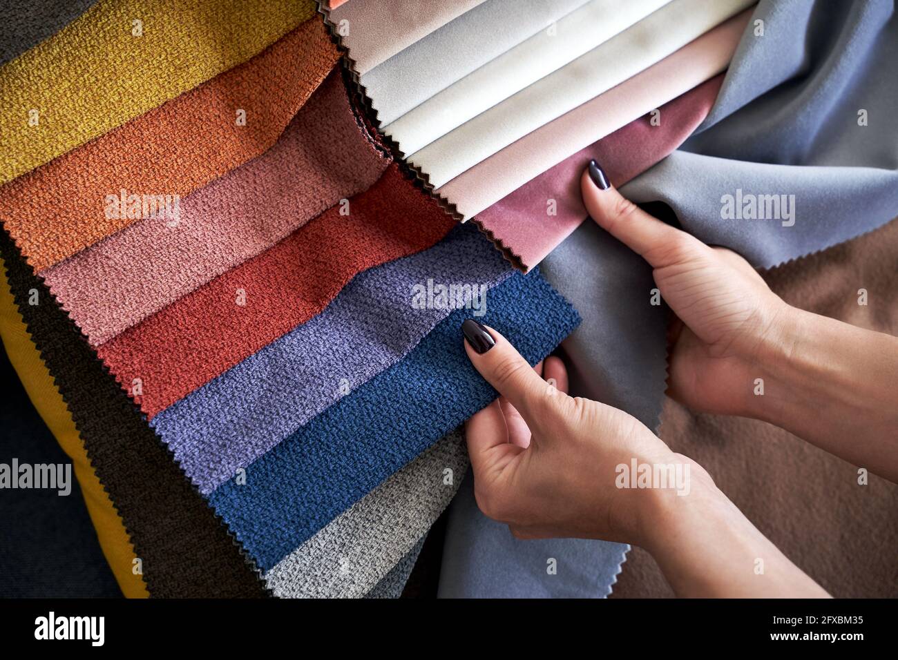 Choosing upholstery fabric color and texture from various colorful ...