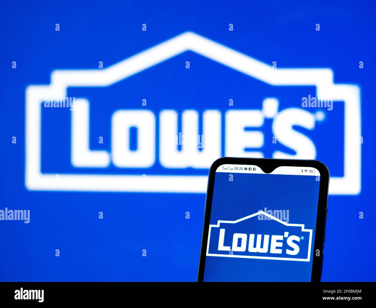In this photo illustration, a Lowe's Companies, Inc. logo seen ...