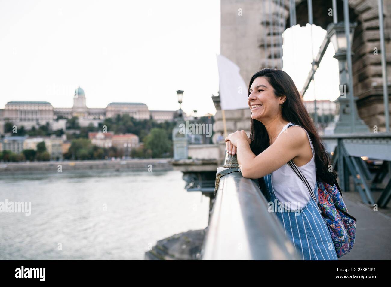 Leaning on bridge railing hi-res stock photography and images - Alamy