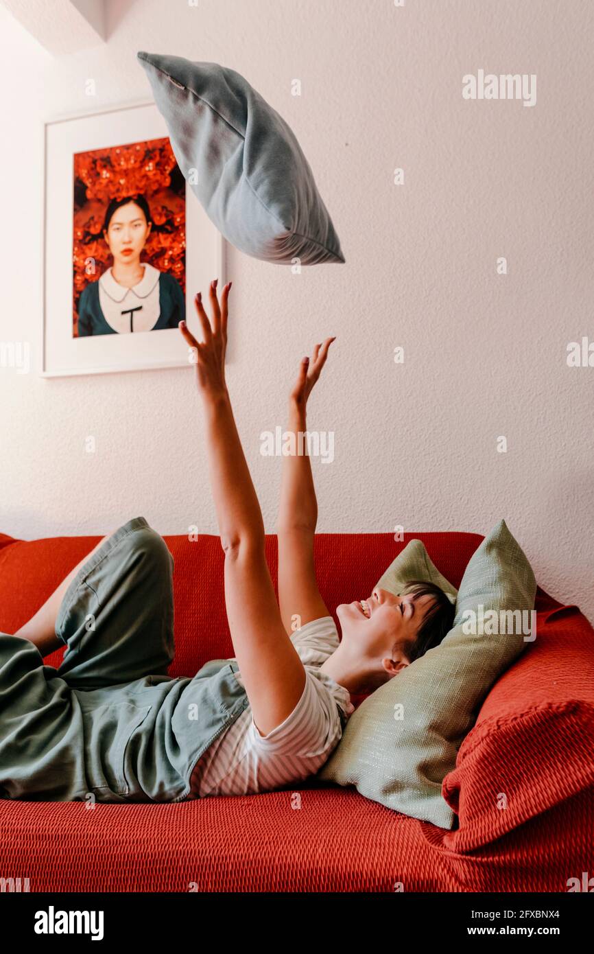 Sofa back cushion woman hi-res stock photography and images - Alamy