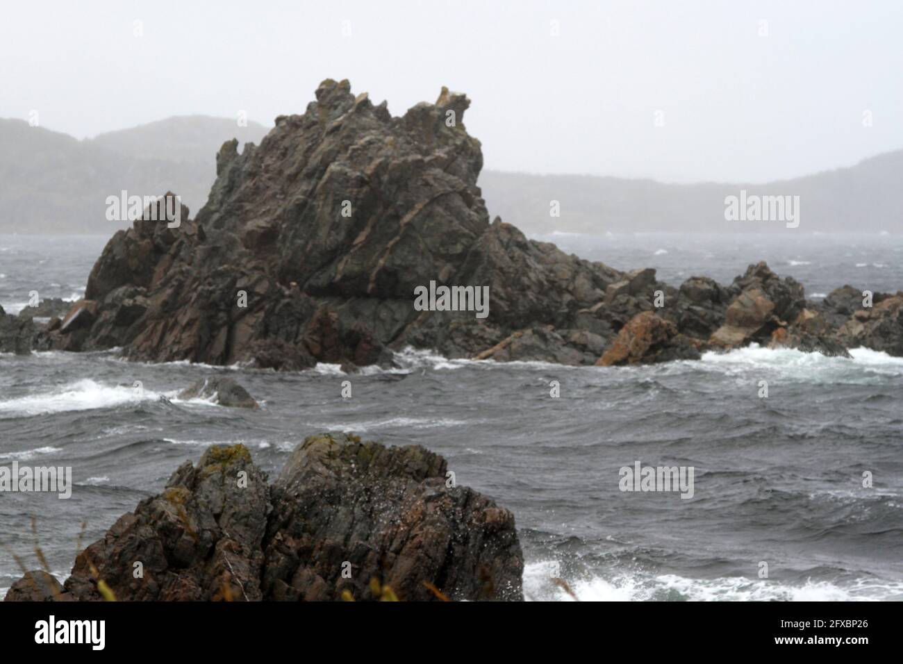 Water splashing over a rock hi-res stock photography and images - Alamy