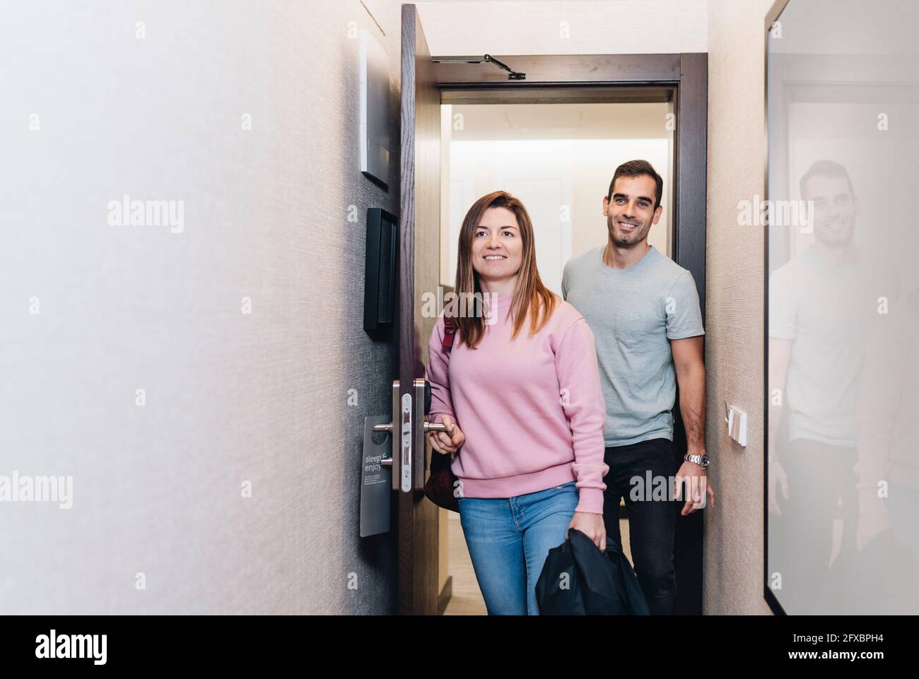 Couple People Entering High Resolution Stock Photography and Images - Alamy