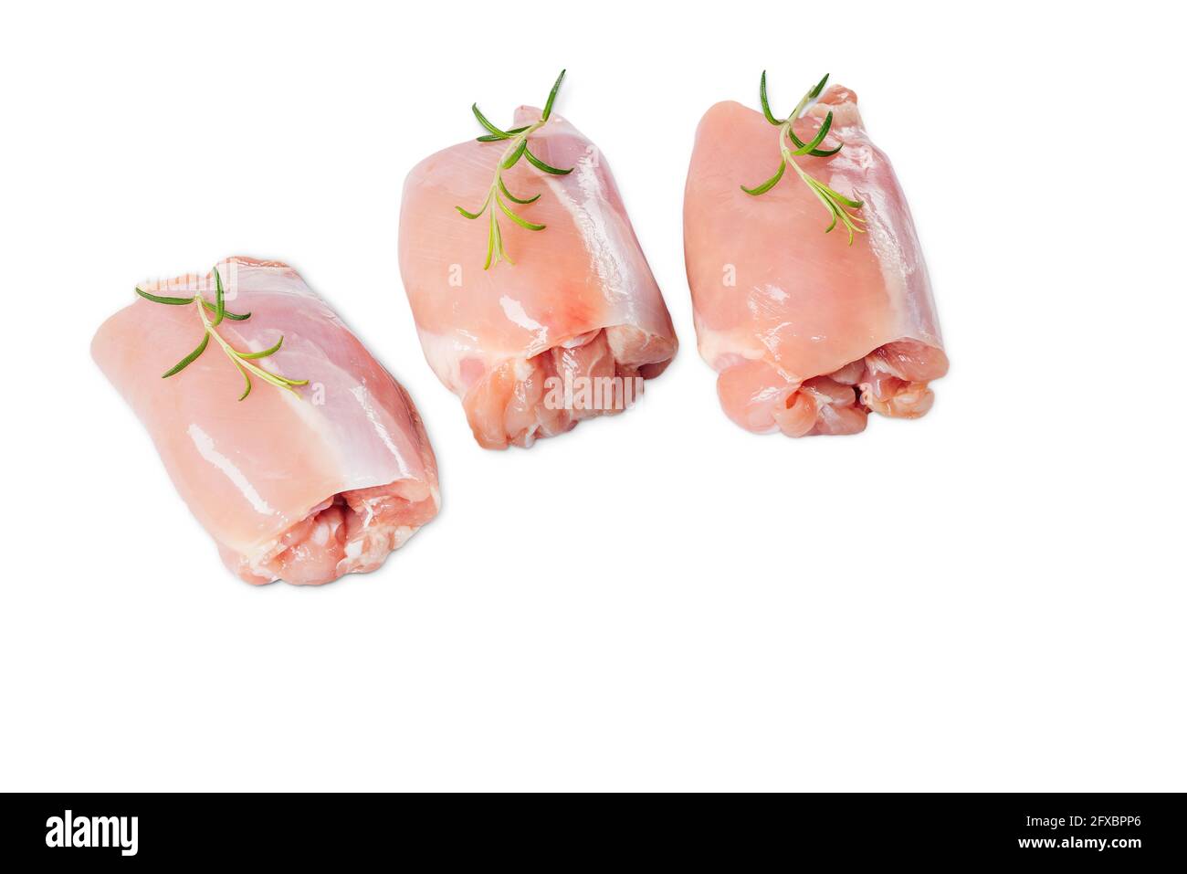 Raw chicken thigh without skin on a white background isolade. Three ...