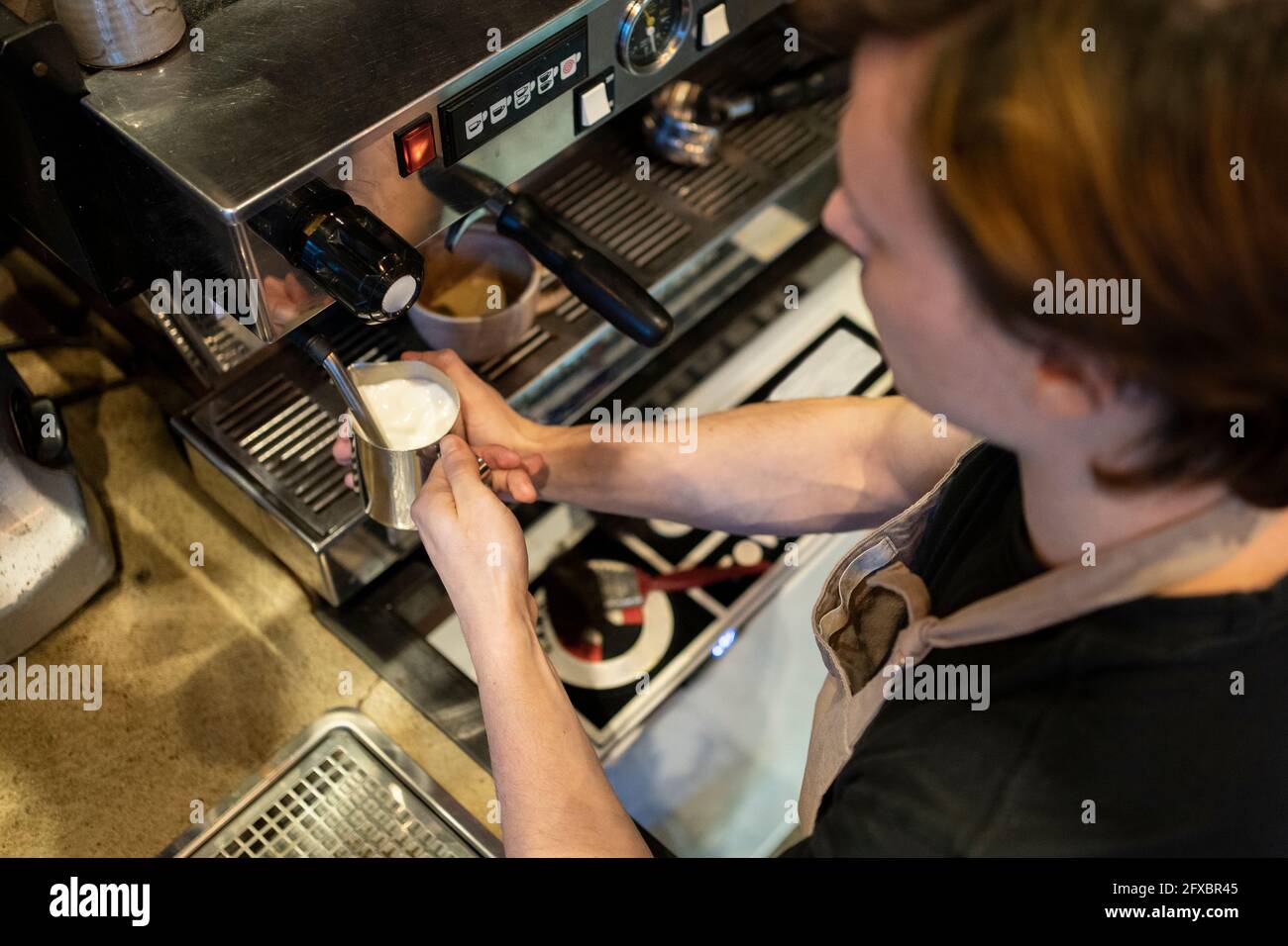 Barista making coffee at cafe Stock Photo - Alamy