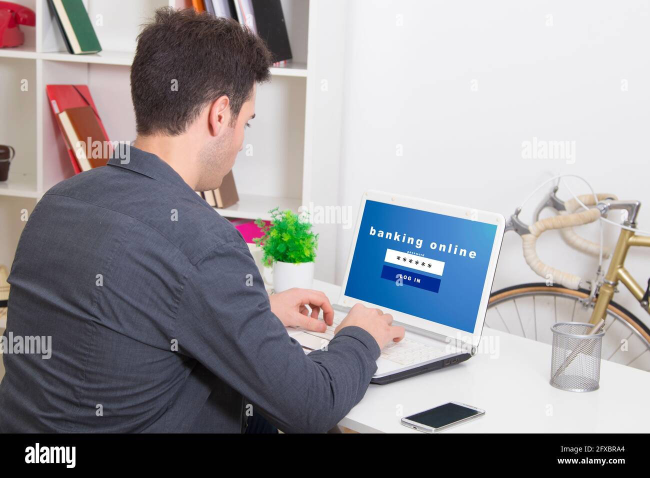man at the desk or office with computer banking Stock Photo - Alamy