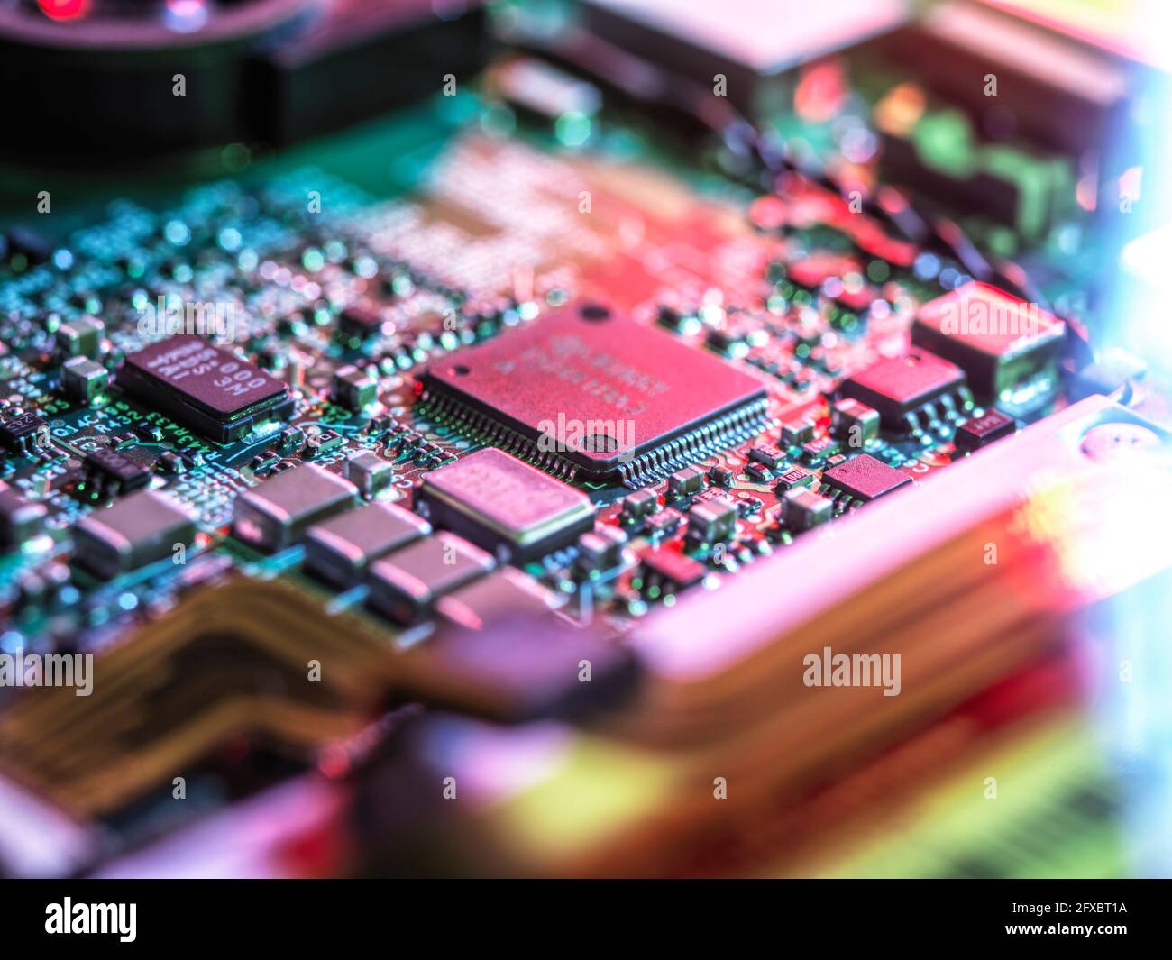 Inside of computer hardware showing chips and circuit board Stock Photo ...