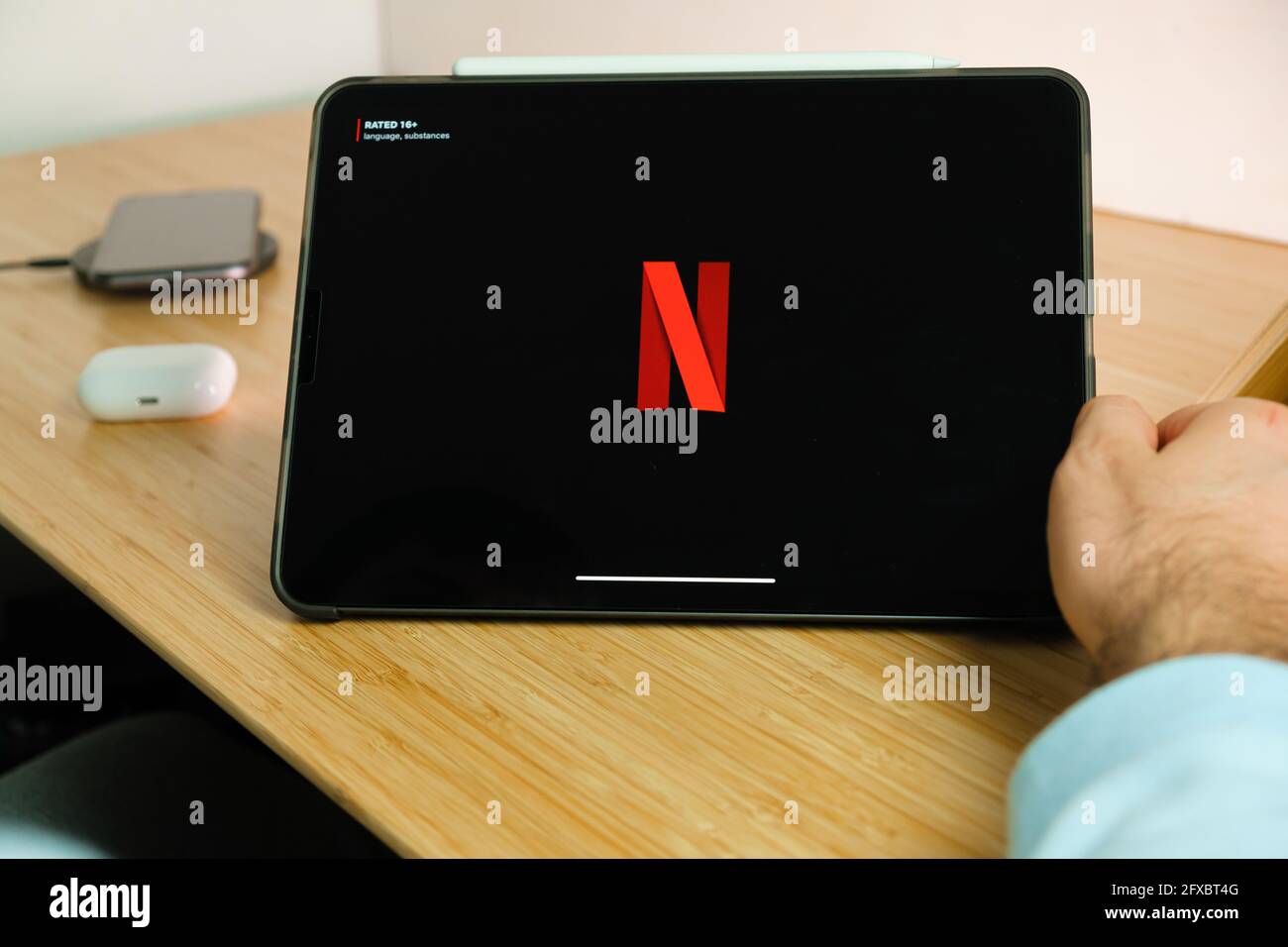 Netflix logo on the screen of iPad tablet. March 2021, San Francisco ...