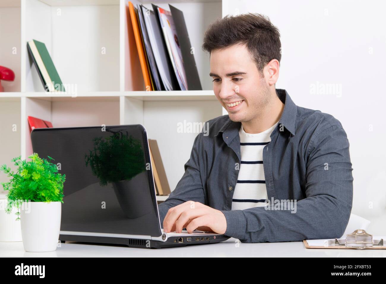 man typing on the computer at home or in the office Stock Photo - Alamy