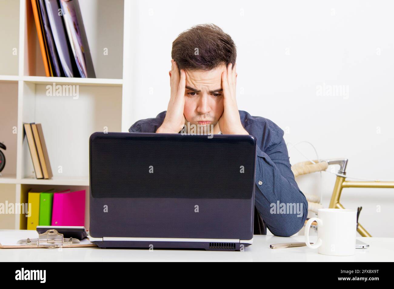 Young man in front of the computer hi-res stock photography and images ...