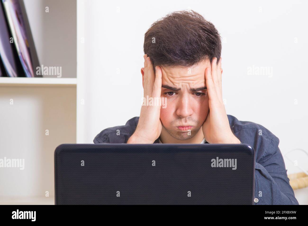 Young man in front of the computer hi-res stock photography and images ...