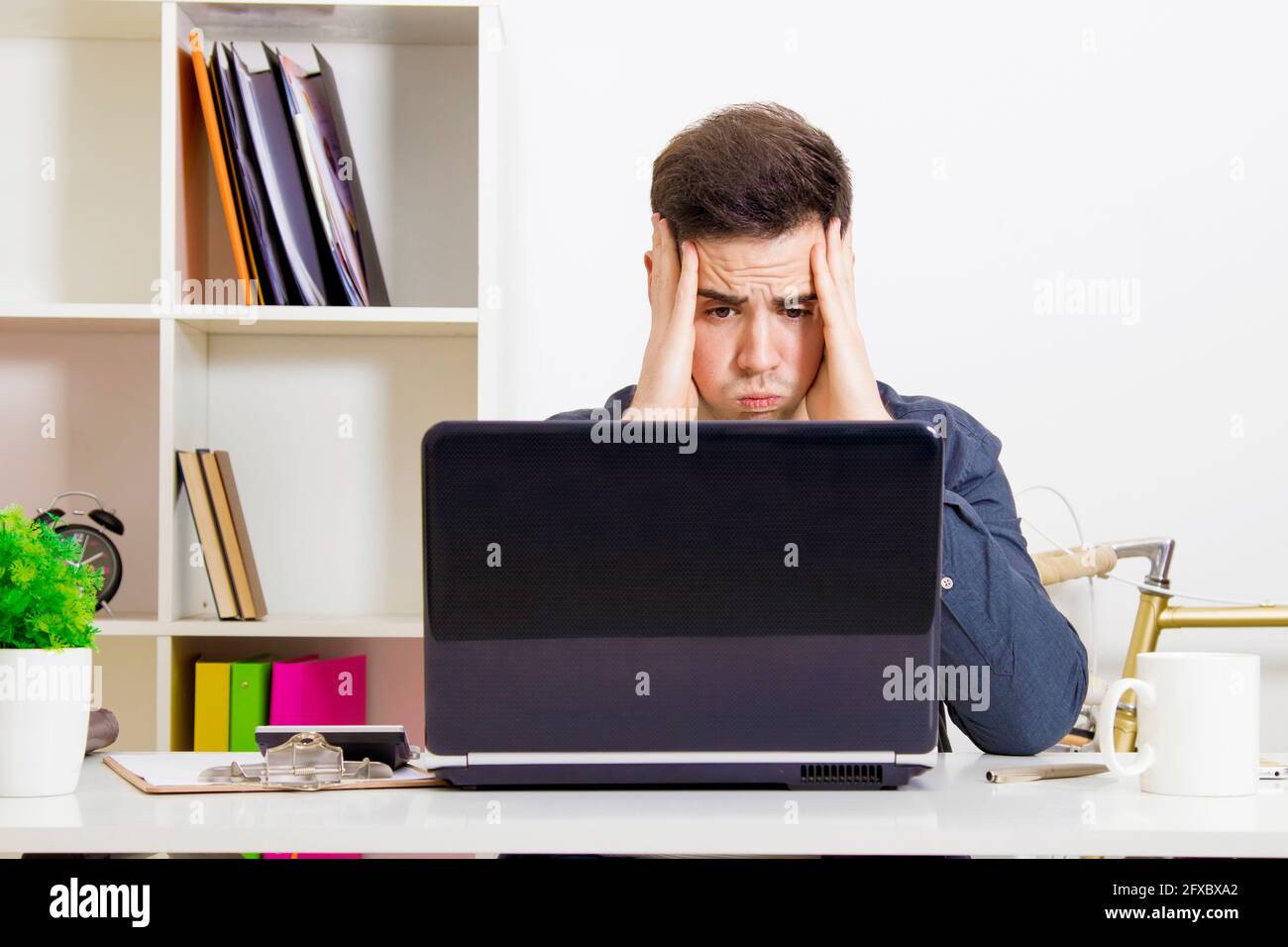 Young man in front of the computer hi-res stock photography and images ...