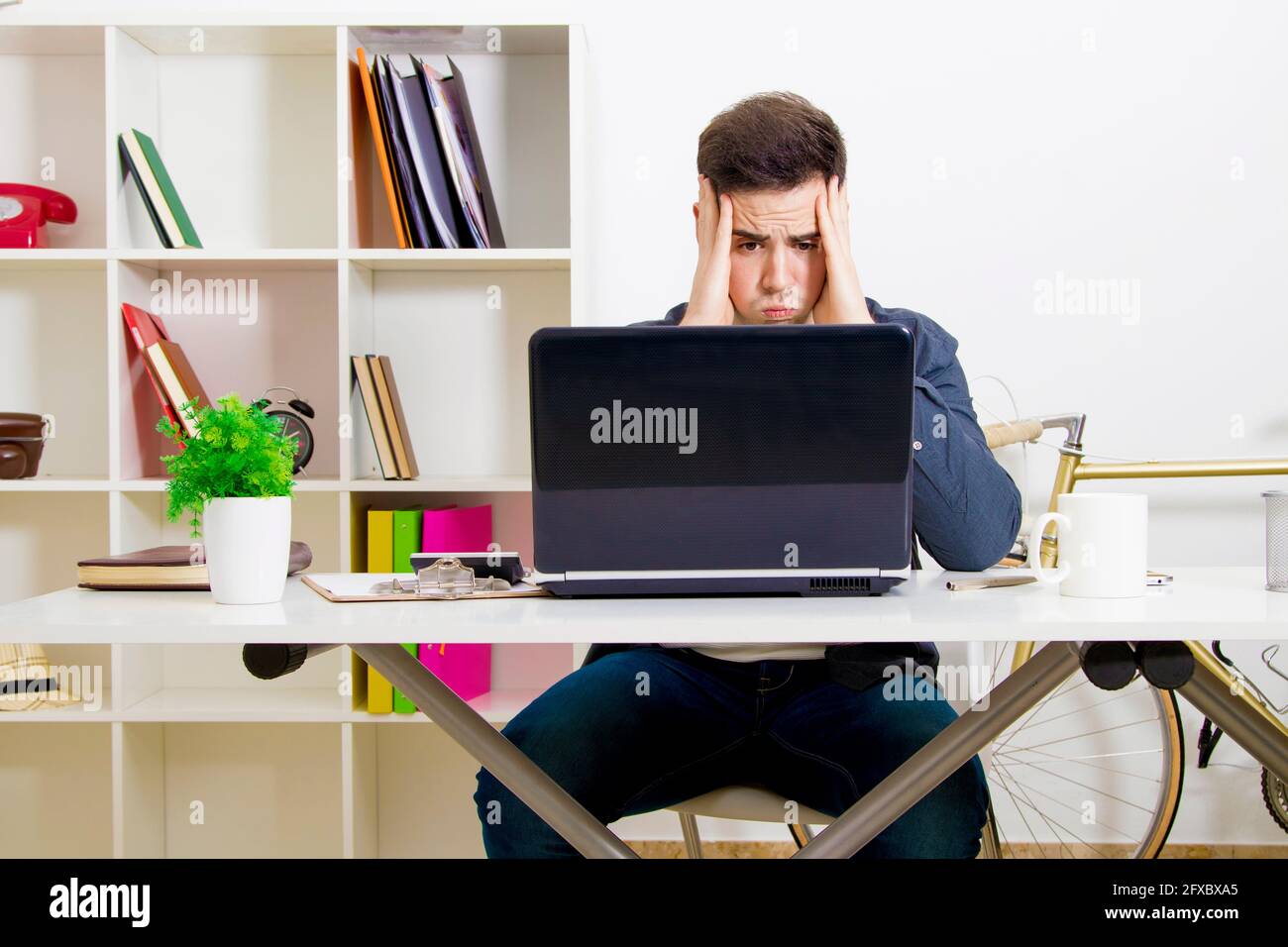 Young man in front of the computer hi-res stock photography and images ...
