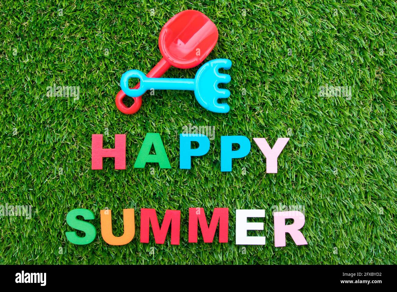 summer background with letters on green grass Stock Photo - Alamy