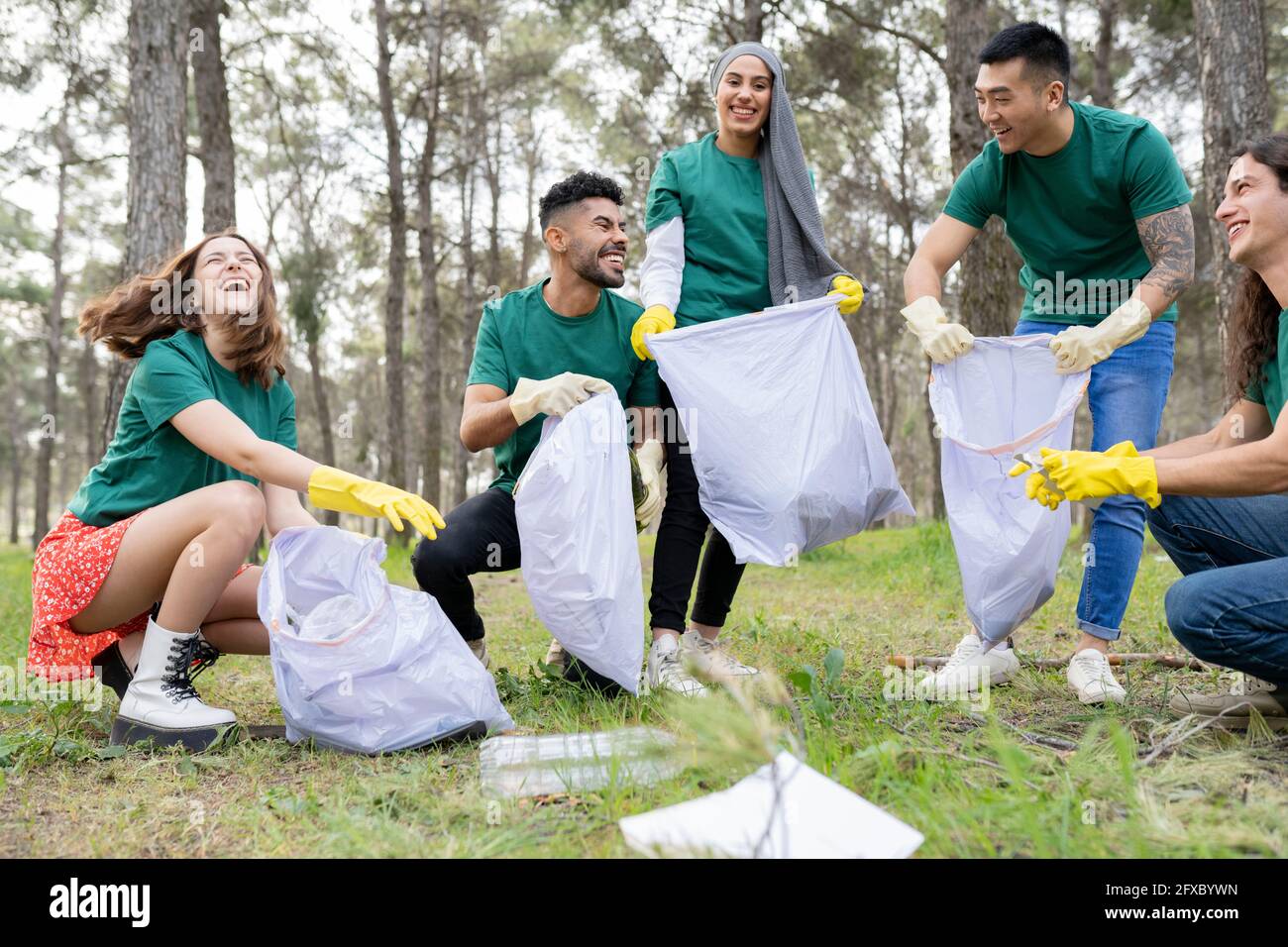 Group holding plastic bag hi-res stock photography and images - Alamy