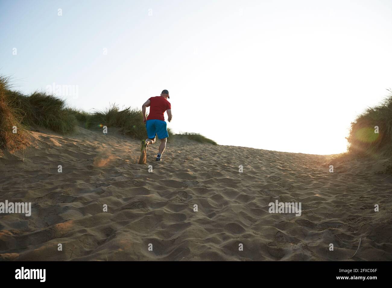 Running on sand hi-res stock photography and images - Alamy