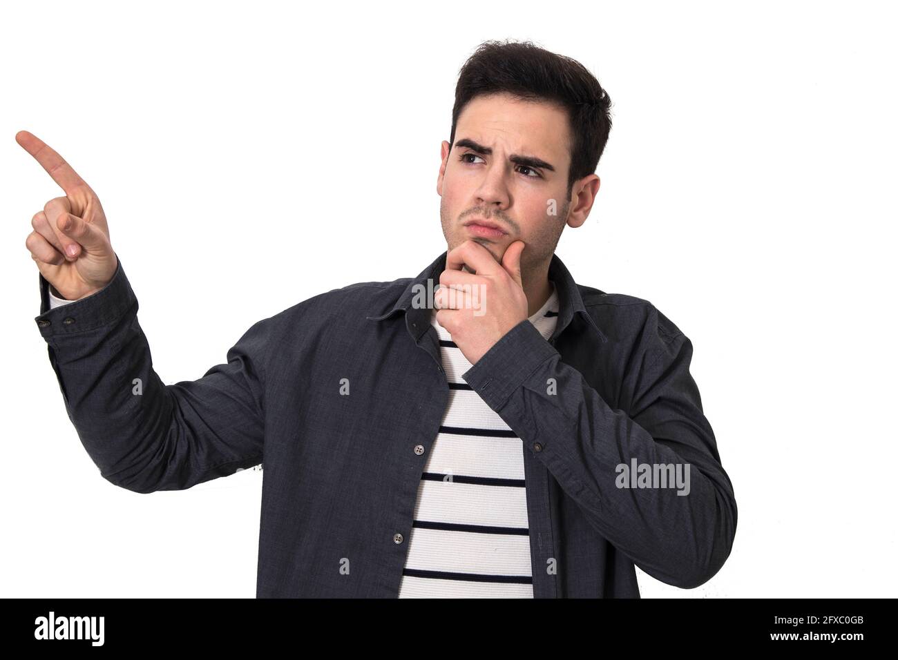 thoughtful young man isolated on white background Stock Photo - Alamy