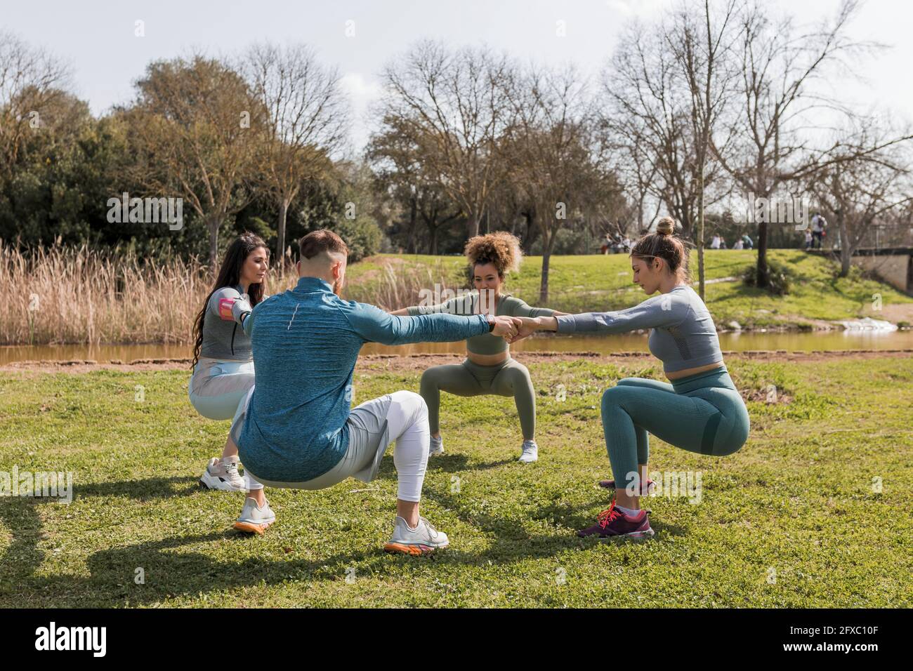 Male squatting hi-res stock photography and images - Alamy