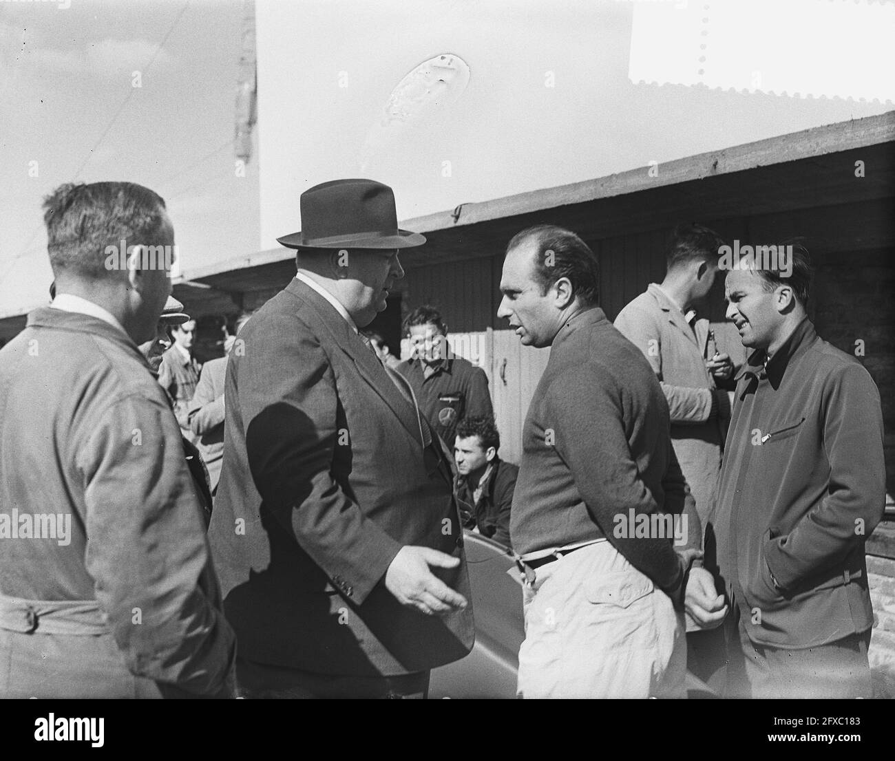 Juan Manuel Fangio and Alfred Neubauer 1955 Dutch GP Stock Photo - Alamy