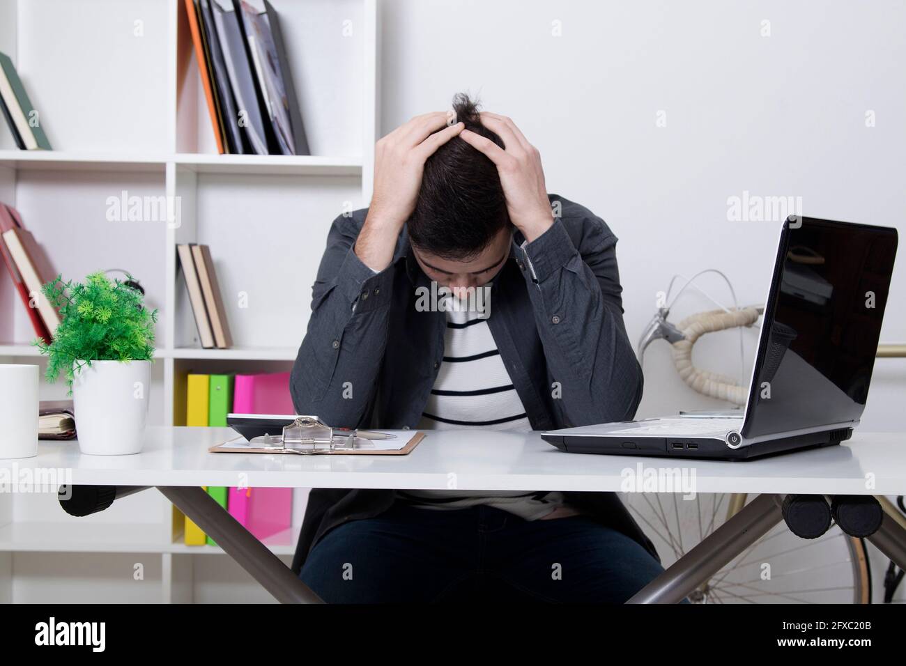 Tired stressed businessman overwhelmed problems hi-res stock ...