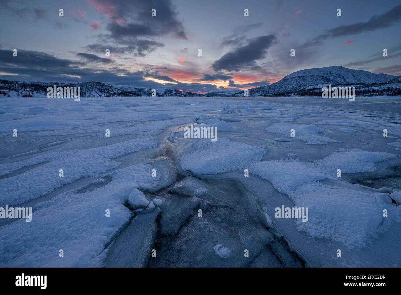 Norway, Tromso, Frozen lake on Senja Island at sunrise Stock Photo - Alamy