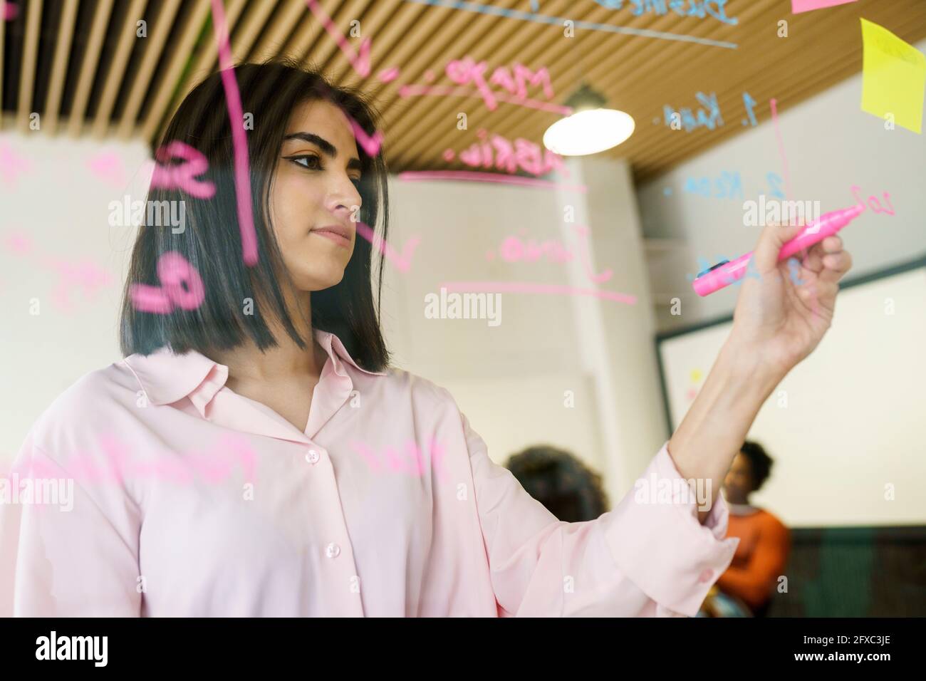Man woman glass writing hi-res stock photography and images - Alamy