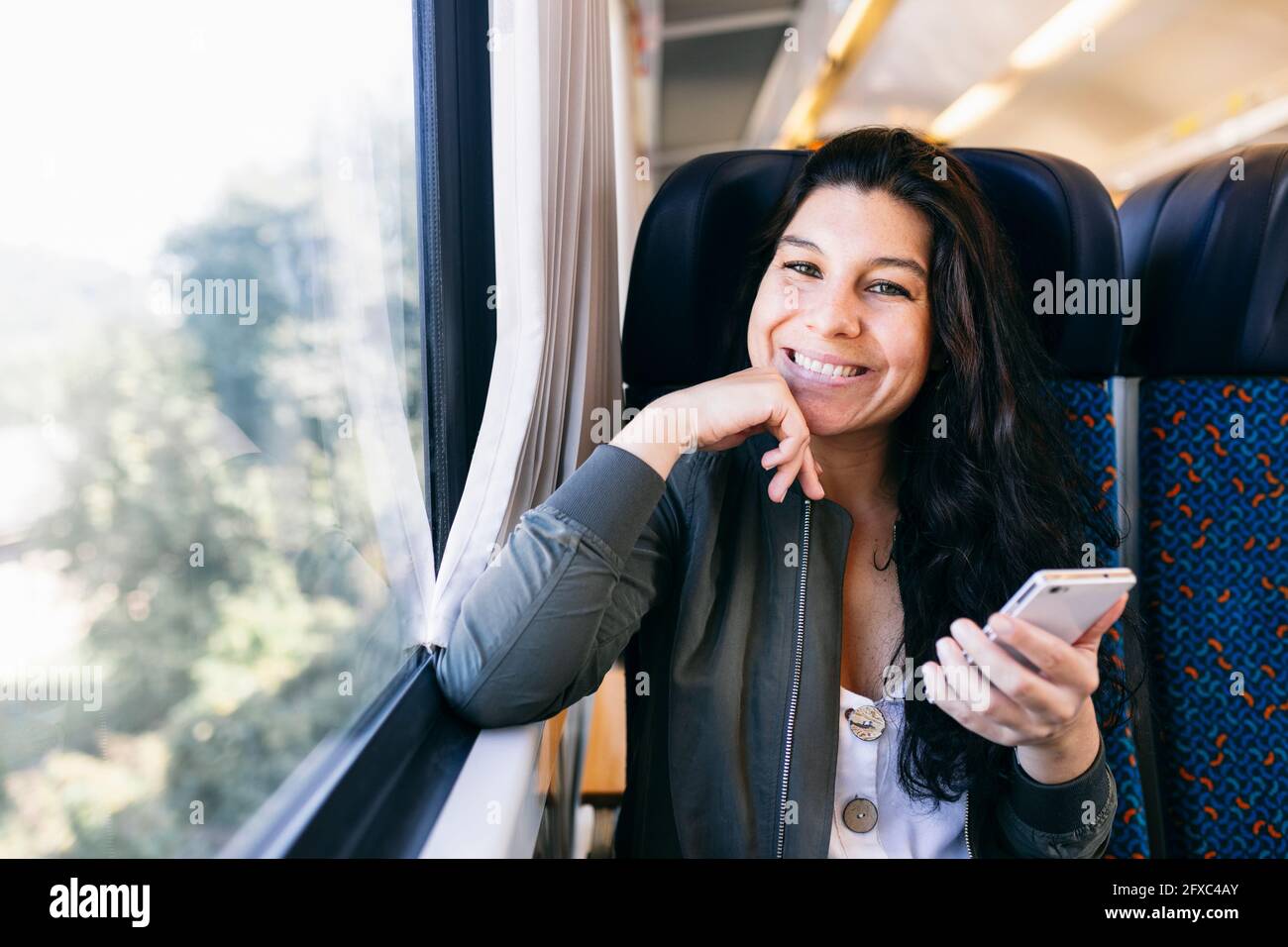 People sitting on train hi-res stock photography and images - Alamy