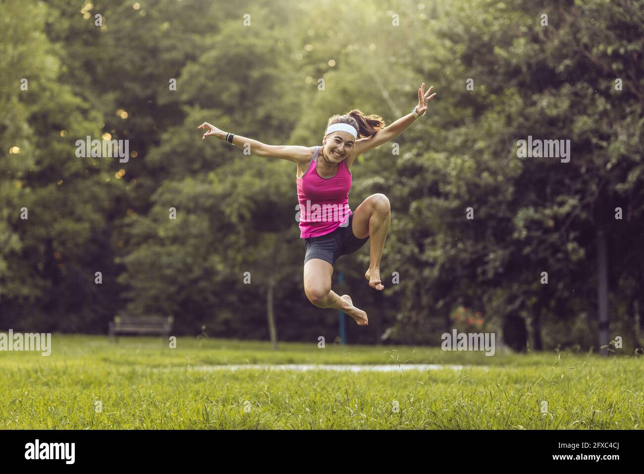 Jumping in grass hi-res stock photography and images - Alamy