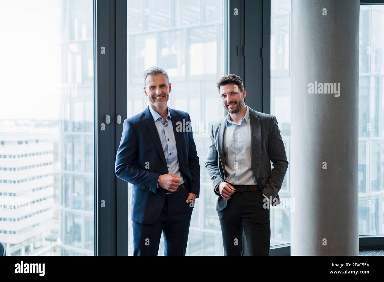 Two work colleagues portrait hi-res stock photography and images - Alamy