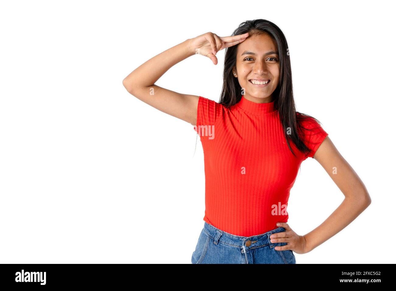 Beautiful Latin woman looking forward waving with her hand on her ...