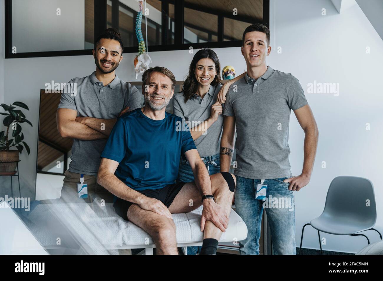 Man standing behind table hi-res stock photography and images - Alamy