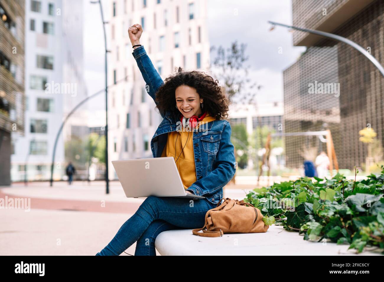 Curly woman cheering hi-res stock photography and images - Alamy