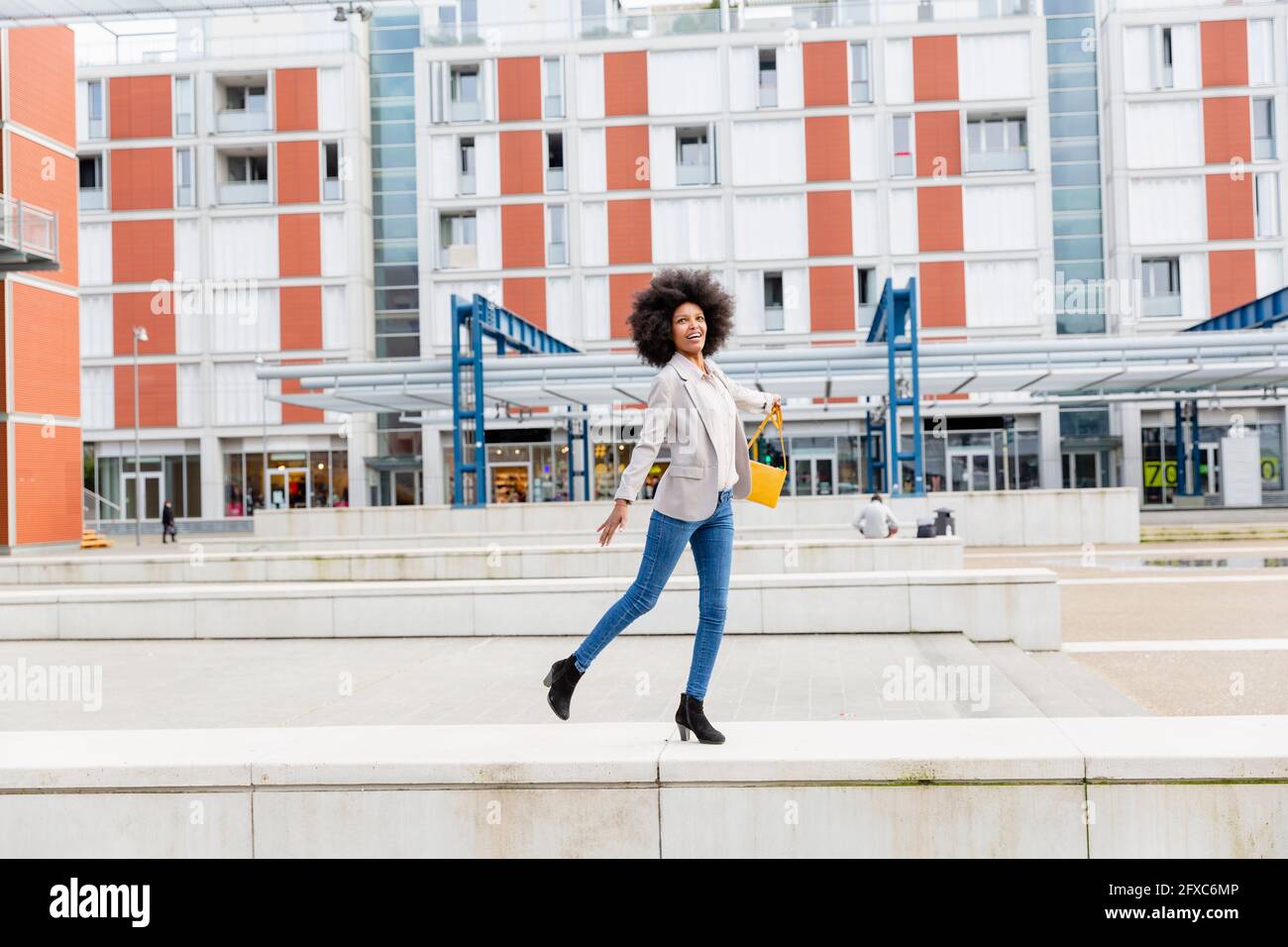 Female professional dancing on retaining wall outdoors Stock Photo - Alamy
