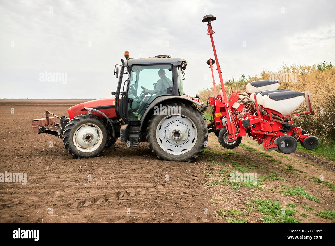 Man driving tractor hi-res stock photography and images - Alamy
