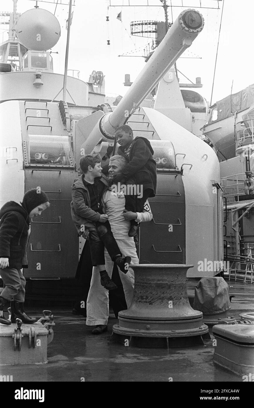 Children visiting German training ships in Amsterdam climbing and ...